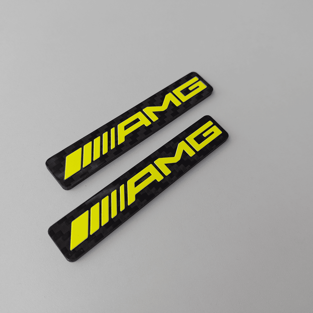 AMG Coloured Vehicle Badges - Pair | CarbonTeq UK